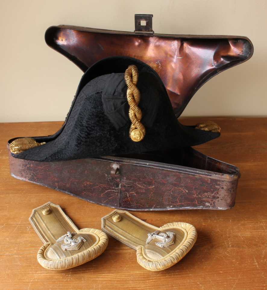 British Royal Navy Bicorn Hat & Lieutenant Epaulettes In Tole Tin Case.