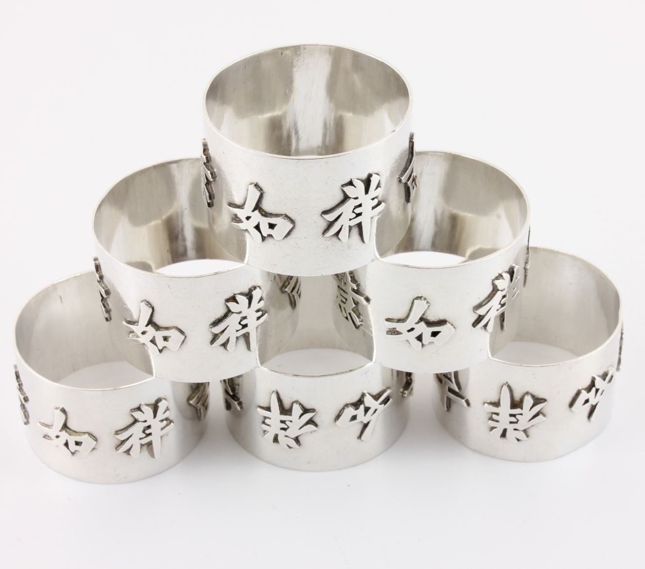 Six Chinese Silver Napkin Rings With Chinese Symbols. Wang Hing c1890.