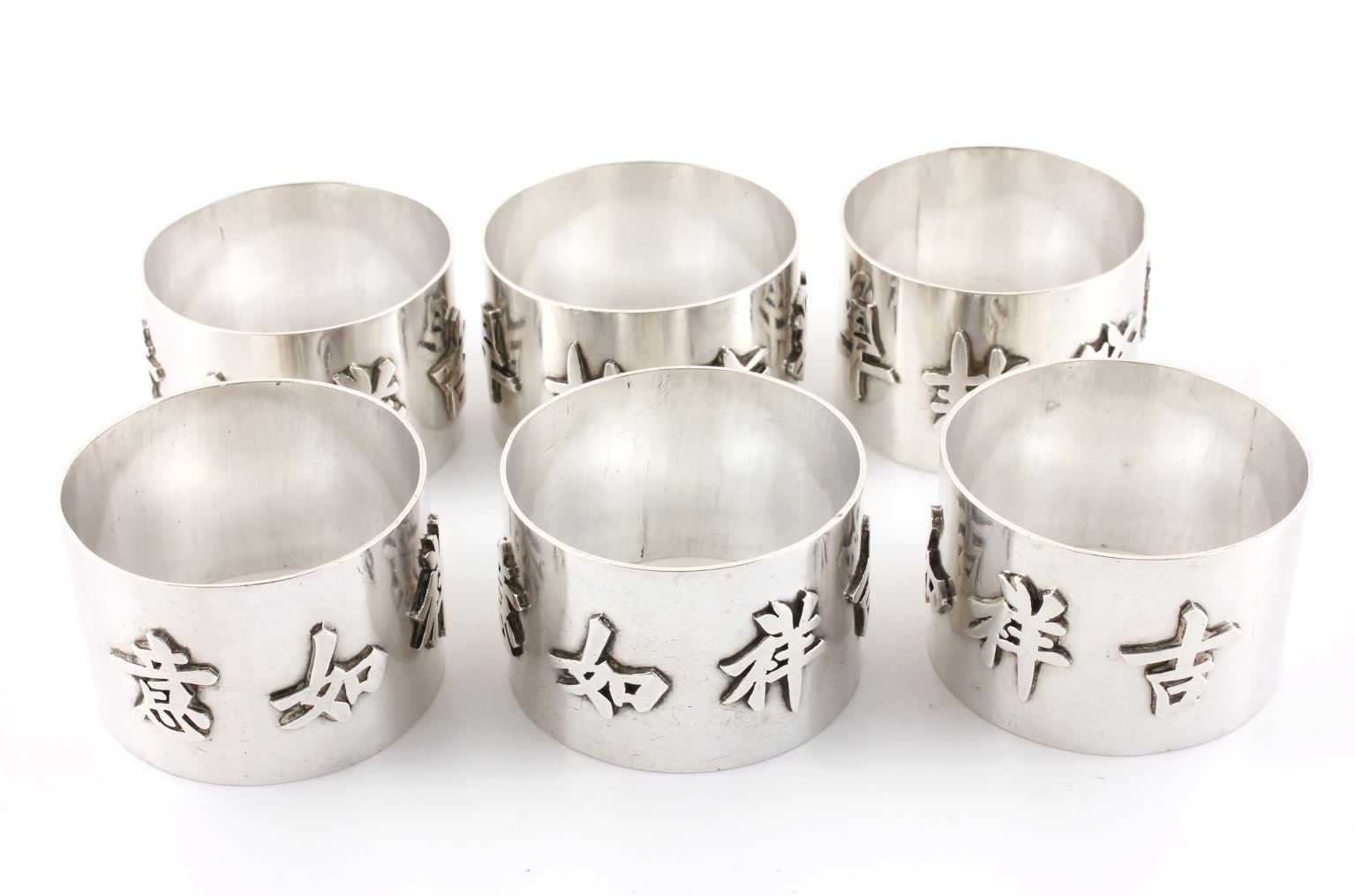 Six Chinese Silver Napkin Rings With Chinese Symbols. Wang Hing c1890.