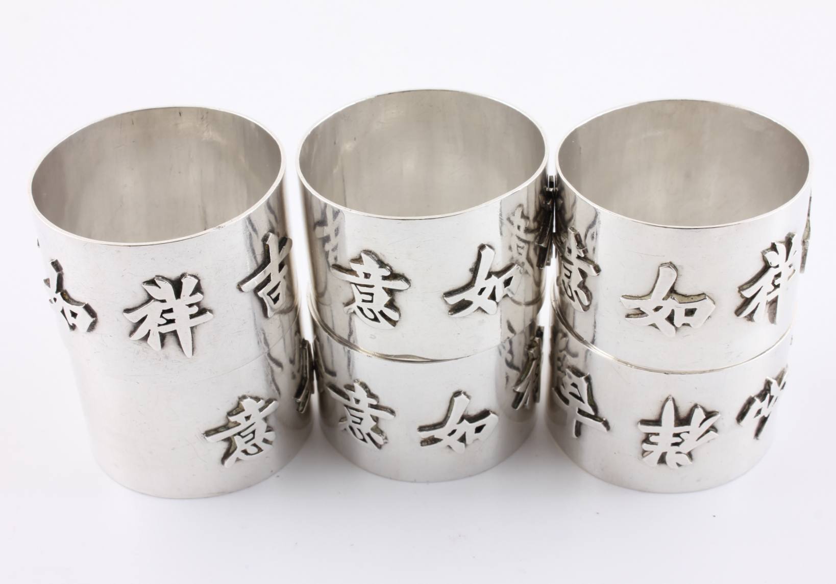 Six Chinese Silver Napkin Rings With Chinese Symbols. Wang Hing c1890.