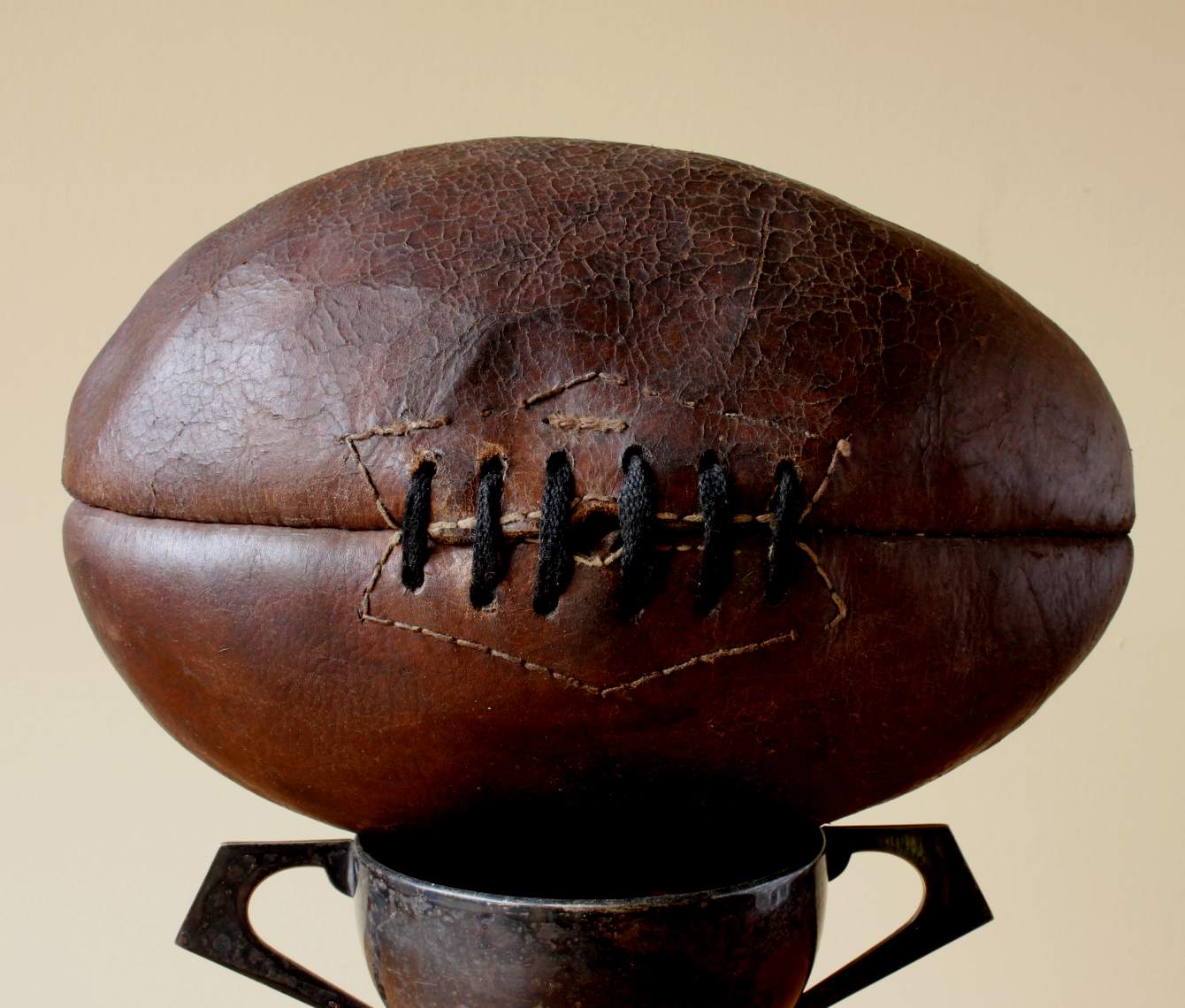Original Antique Brown Leather 4 Panel Laced Rugby Ball. c1920.