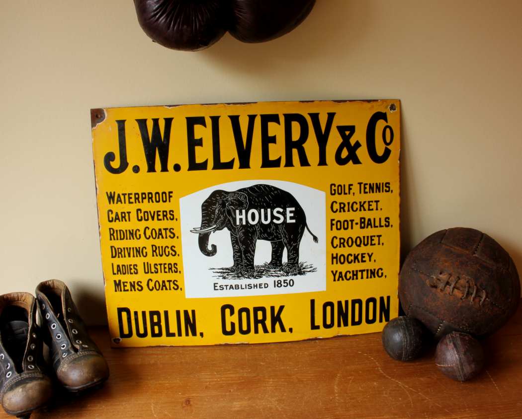 JW Elvery & Co Elephant House Enamel Sign. Dublin Cork London. Sports.