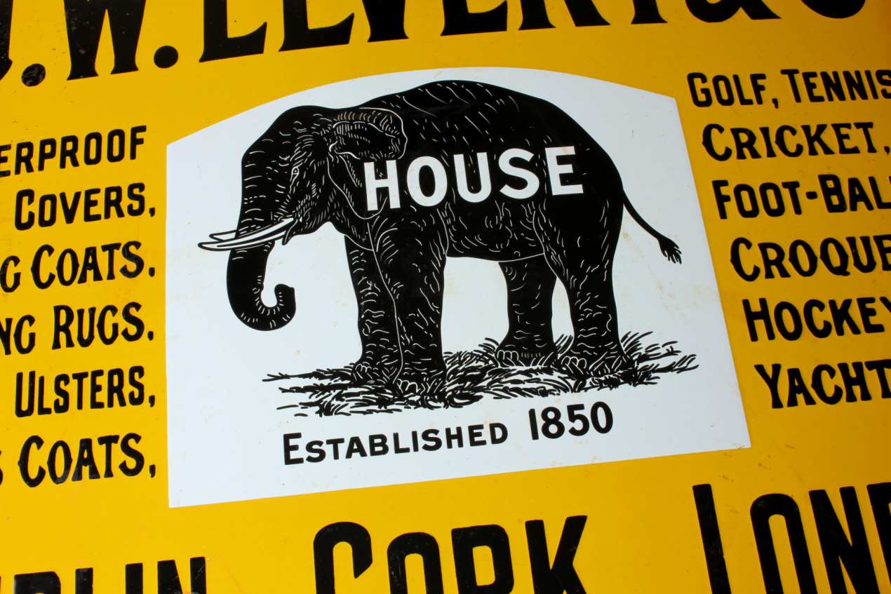 JW Elvery & Co Elephant House Enamel Sign. Dublin Cork London. Sports.