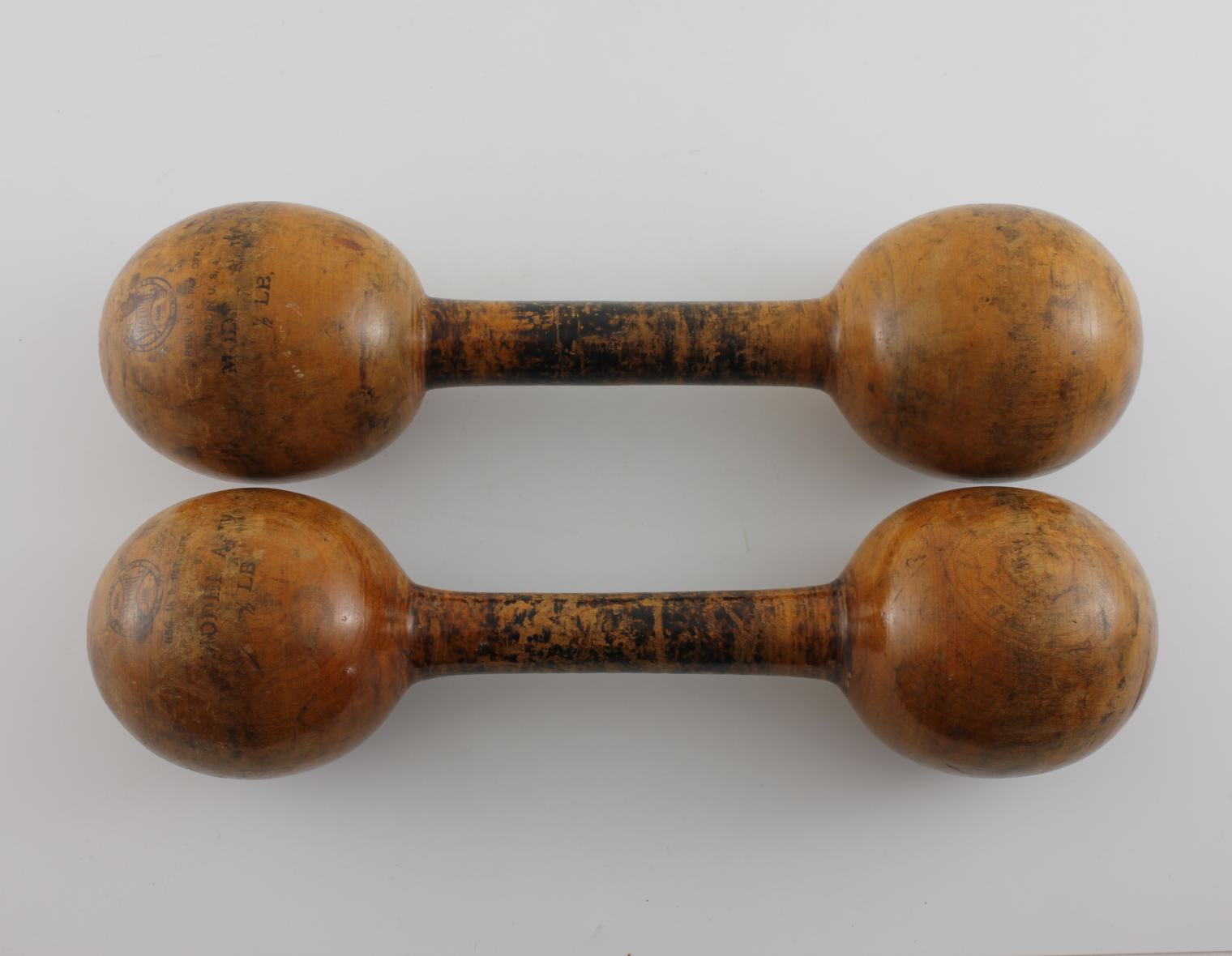 Pair Spalding Wood Gym Dumbbells. USA 1/2 lb Exercise Weights. c1900.